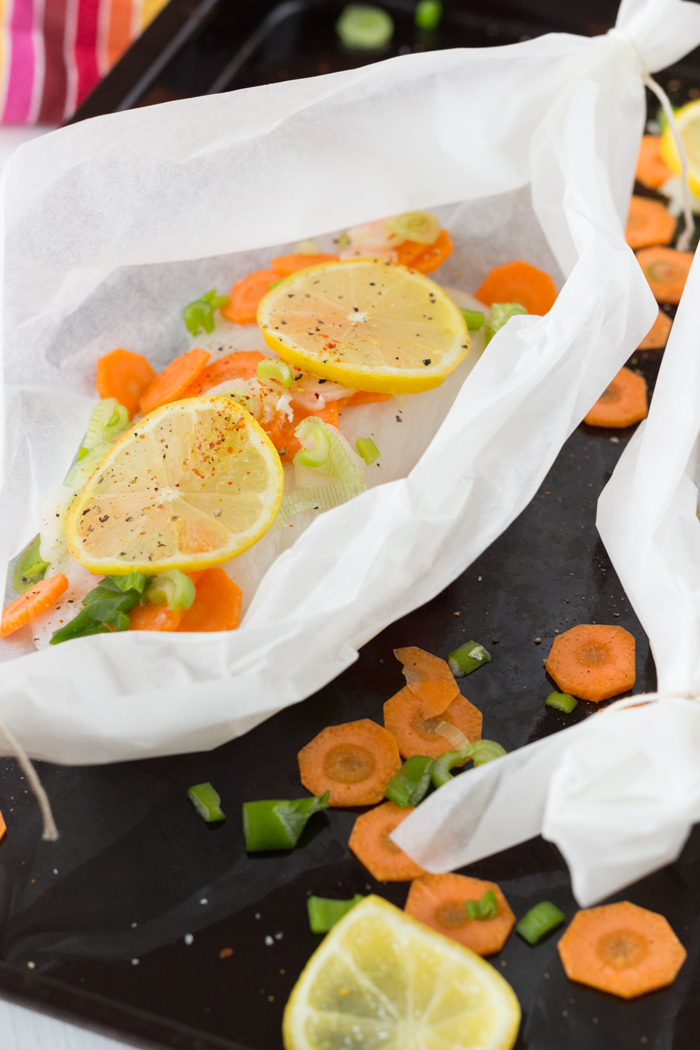 Cod en papillote with lemon and spring onions